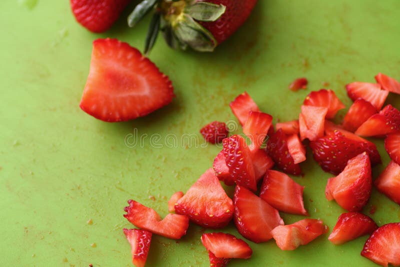 Fresh chopped strawberries stock image. Image of board - 53974483