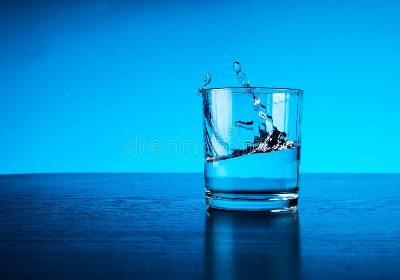 Fresh Clear Blue Water Splash in Glass Stock Photo - Image of health ...