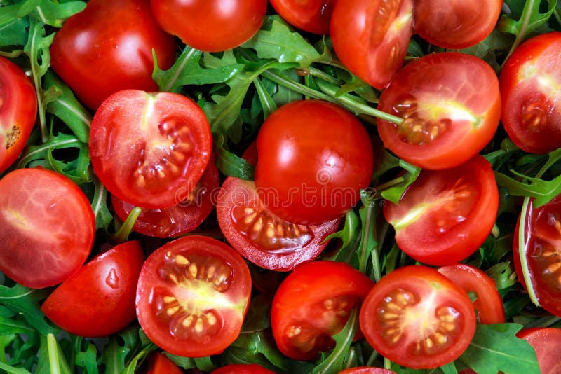 Fresh Close Up Cherry Tomato Salad with Rocket Leaves Stock Image ...