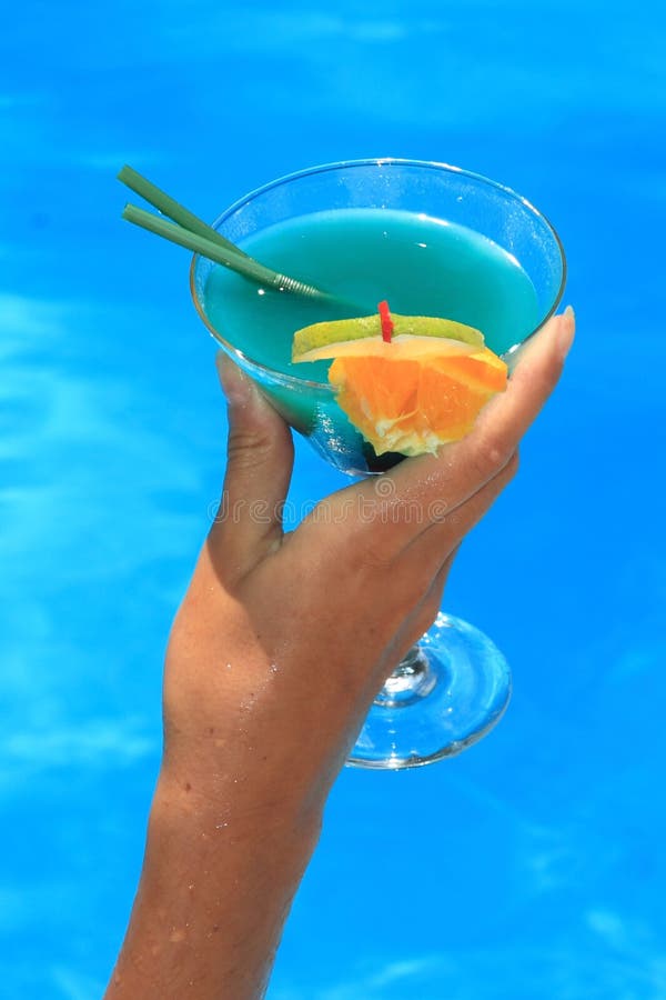 Fresh cocktail by the pool stock photo. Image of glass - 6294634
