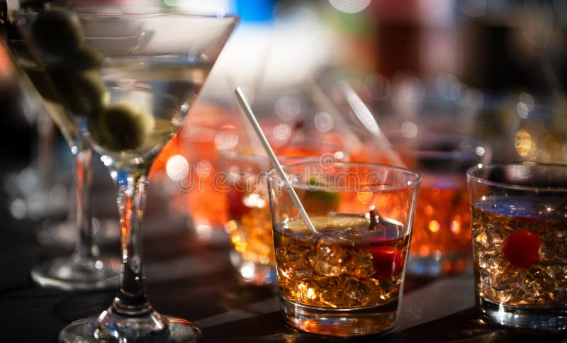 Cocktails at a Bar stock image. Image of liquor, night - 262779151