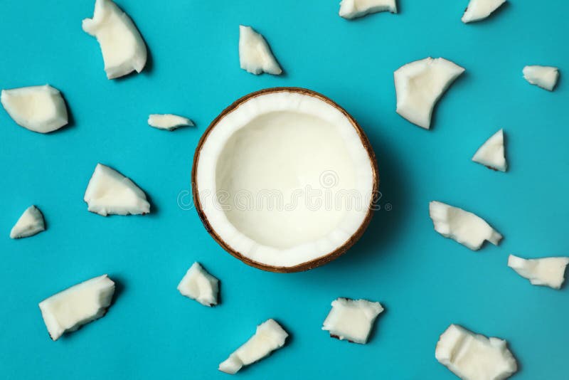 Fresh Coconut Pieces on Blue Background, F Stock Photo - Image of ...