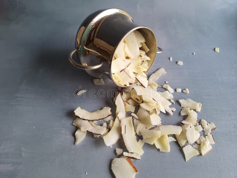 Fresh Coconut in Strips, in a Silver Bowl. Stock Photo - Image of ...