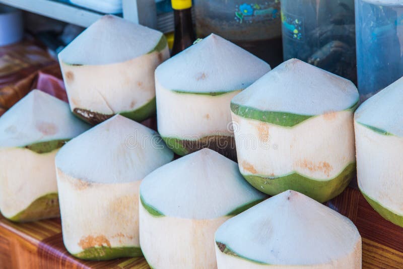 Coconuts at a stand stock image. Image of uanawatuna - 75641011