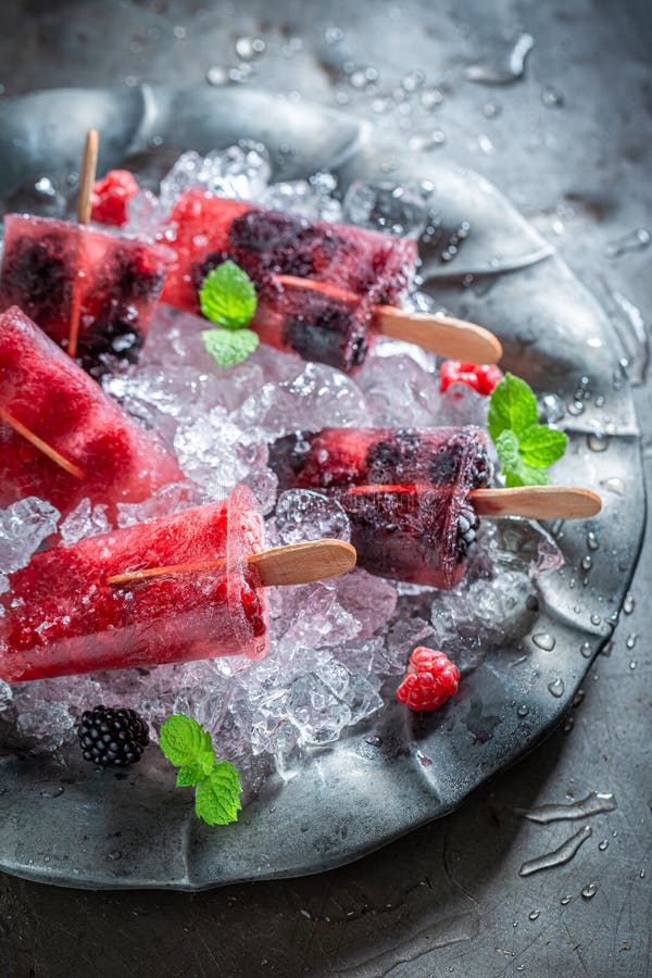Fresh and Cold Ice Cream with Berries on Cold Ice Stock Image - Image ...