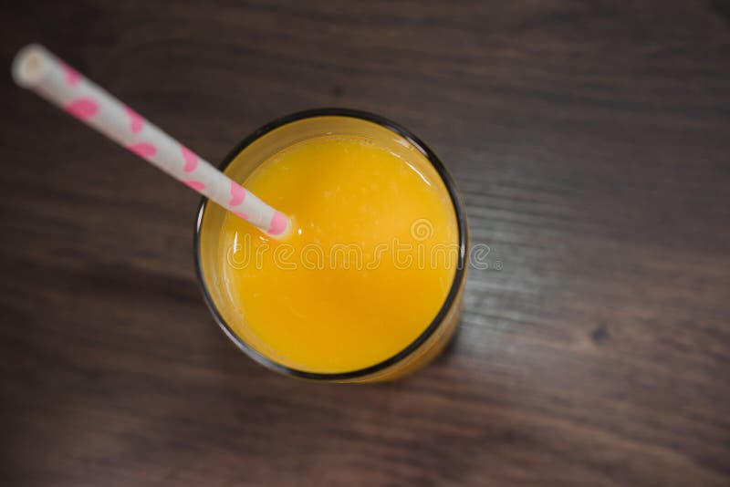 Fresh Cold Juice in a Glass with a Straw Stock Photo - Image of ...