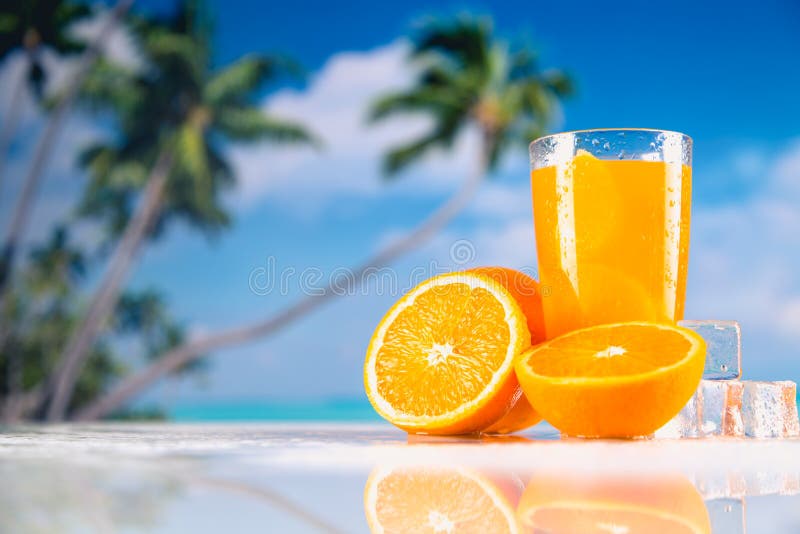 Fresh and Cold Orange Juice Served on Beach Stock Image - Image of ...