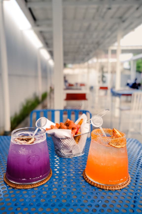 Fresh Iced Butterfly Pea and Orange Soda Drinks and Fried Sausages ...
