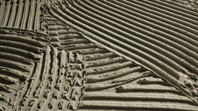 Fresh Concrete Texture with Patterns of Notched Trowel. Macro Shot of ...