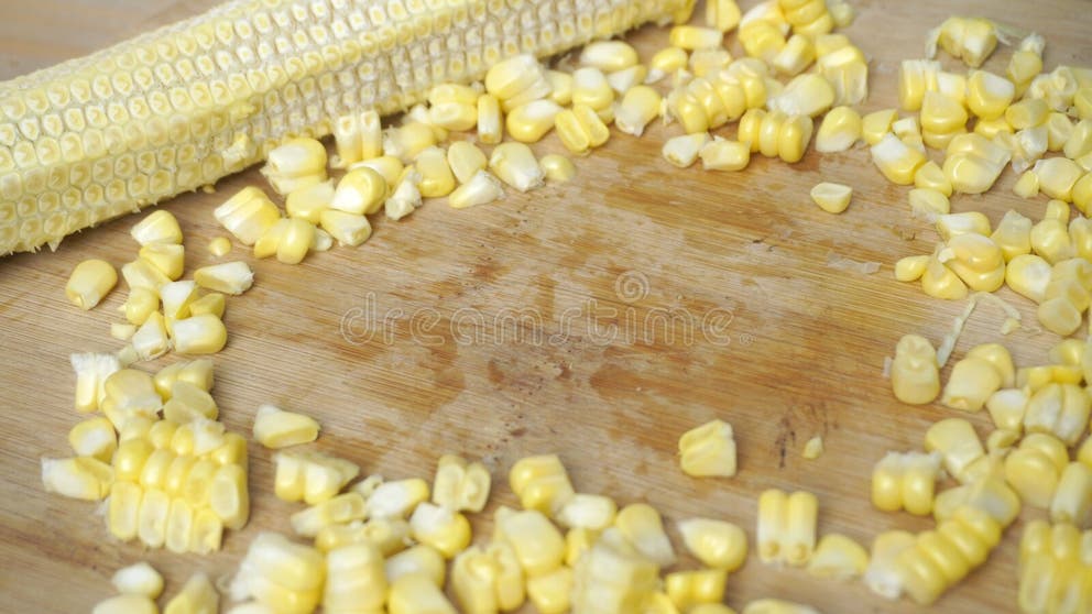 Fresh Cooked Corn is Removed from the Stem Stock Photo - Image of knife ...