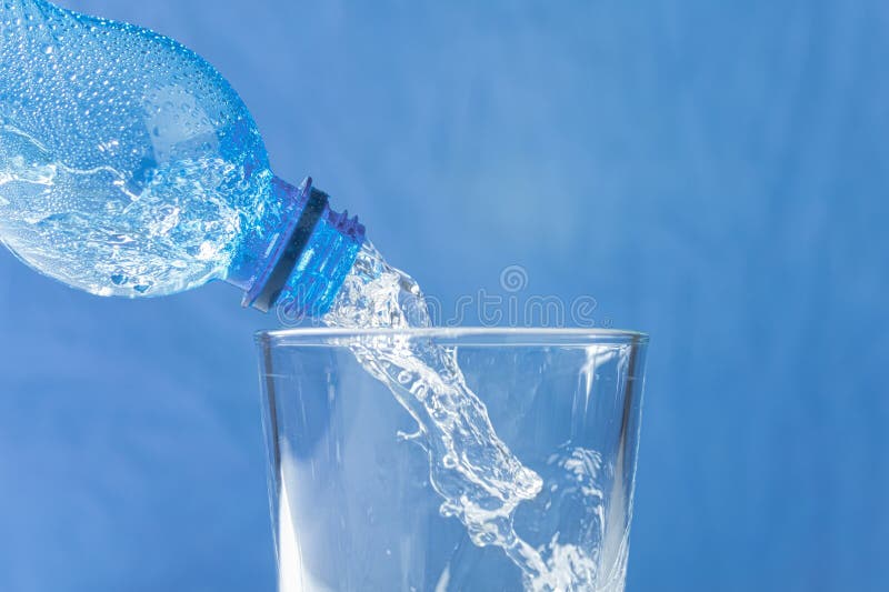 Fresh and Cool Water Flows from the Neck of the Bottle Stock Image ...