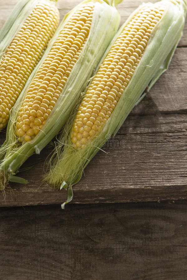 Fresh Corn on Cobs on Old Wooden Table Top View Closeup Stock Image ...