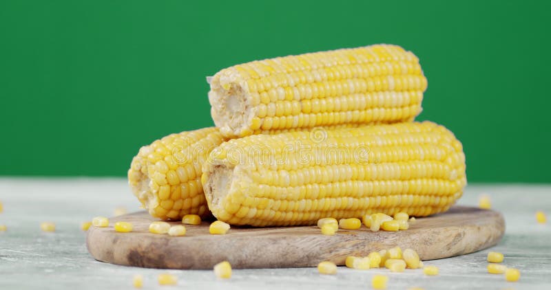 Fresh Corn on the Cutting Board Rotates Slowly. Stock Video - Video of ...