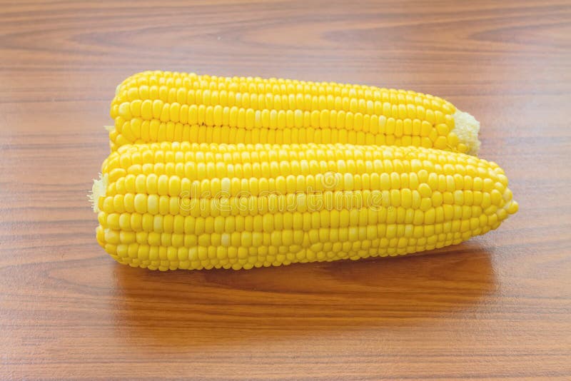 Fresh Corn on Grunge Wood Background Stock Image - Image of light ...