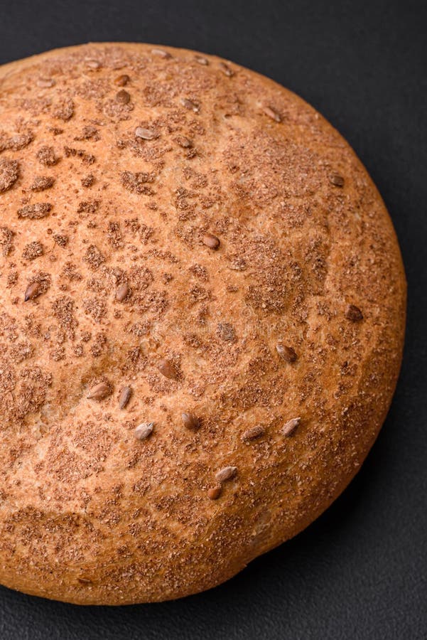 Fresh Crispy Brown Bread with Sesame Seeds and Spices Stock Photo ...