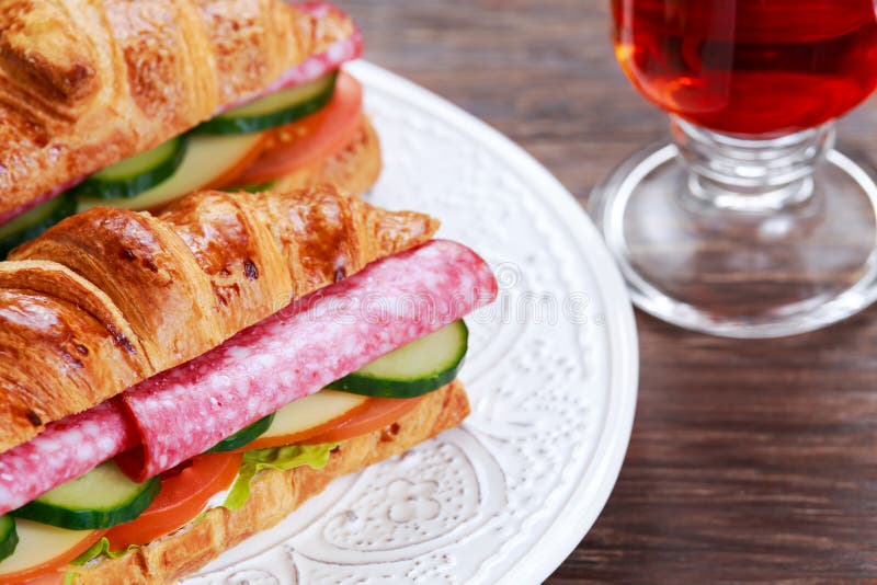 Fresh Croissant with Vegetables, Salami, Chesse and Tea Stock Image ...