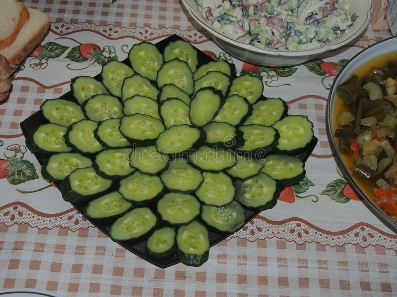 A Fresh Cucumber, Cut into Circles, is Placed on a Square Plate Stock ...