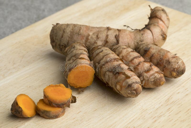Fresh Curcuma Rhizome and Slices Stock Photo - Image of orange, fresh ...