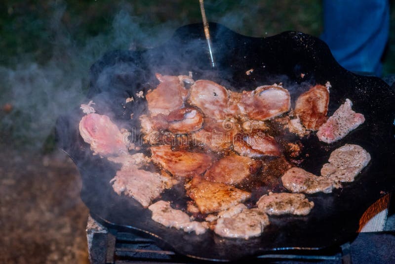 Fresh Cut Bacon Being Cooked Over a Campfire Stock Image - Image of ...