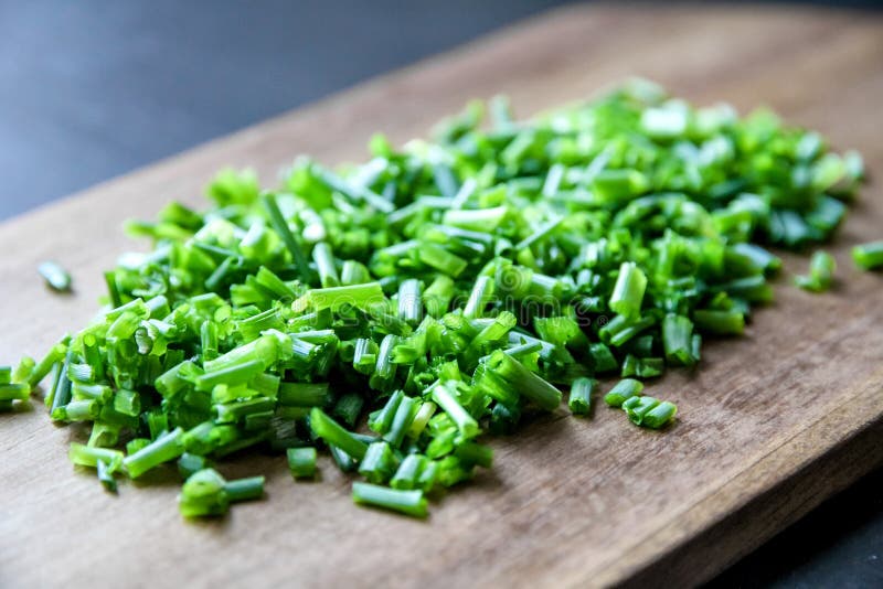 Fresh Cut Chives on a Cutting Board Stock Photo - Image of ingredient ...