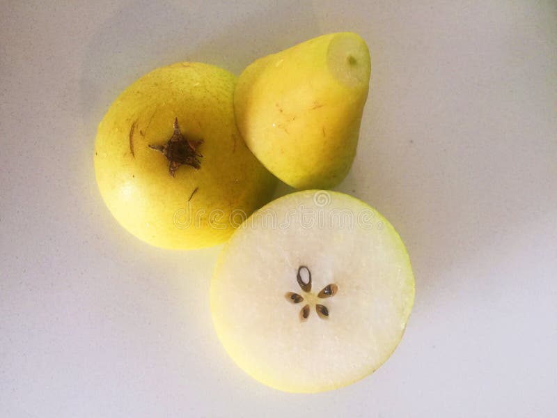 Fresh Cut Golden Pear on White Background Stock Image - Image of ...