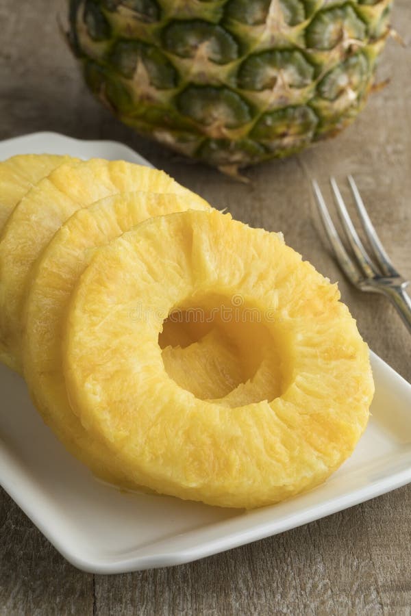 Fresh cut pineapple slices stock photo. Image of juicy - 165015682