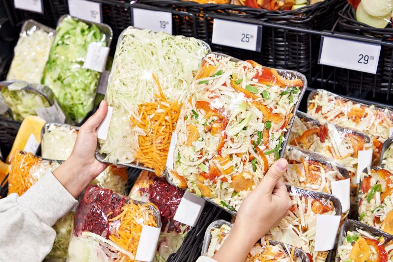 Fresh Cut Vegetables in Hands of Customer in Store Stock Image - Image ...
