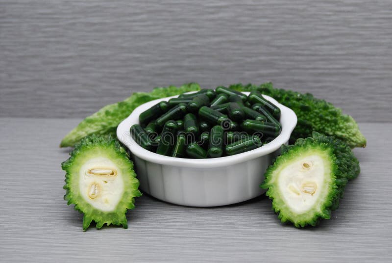 Fresh Cut and Whole Bitter Melon with a Dish of Bitter Melon ...
