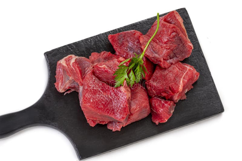 Fresh Cuts of Raw Beef on a Chopping Board Stock Photo - Image of ...