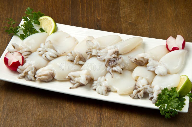 Fresh cuttlefish with peas stock photo. Image of food - 21269252