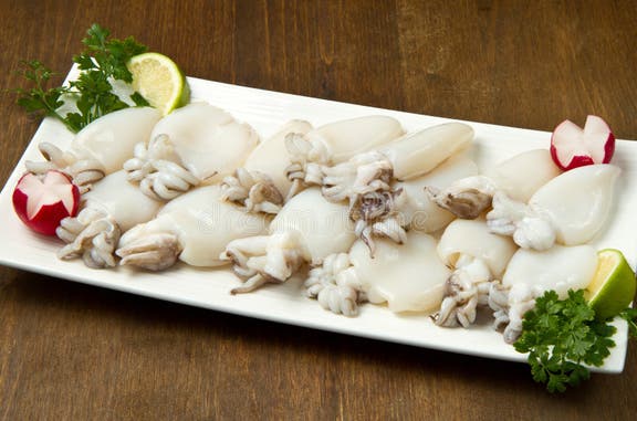 Fresh cuttlefish with peas stock photo. Image of food - 21269252
