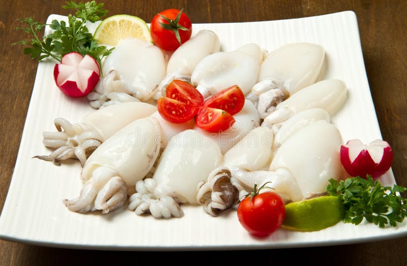 Fresh cuttlefish with peas stock photo. Image of dinner - 21269356