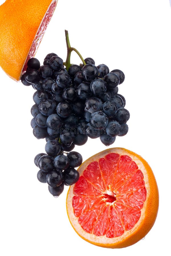 Fresh Dark Blue Grape with Red Grapefruit Isolated on White Background ...