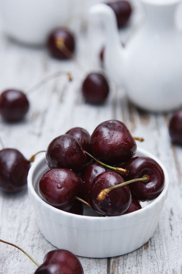 Fresh dark red cherries stock photo. Image of white, table - 29587316