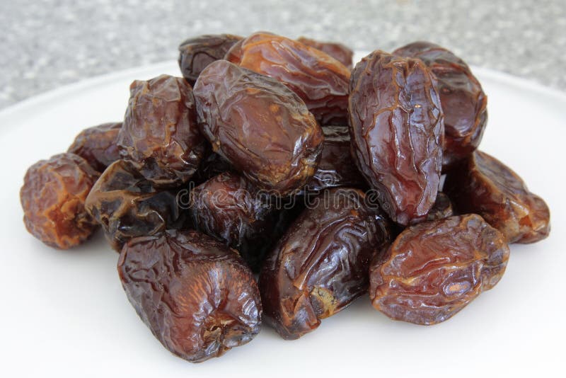 Fresh Dates on a Plate on the Kitchen Bench Stock Image - Image of ...