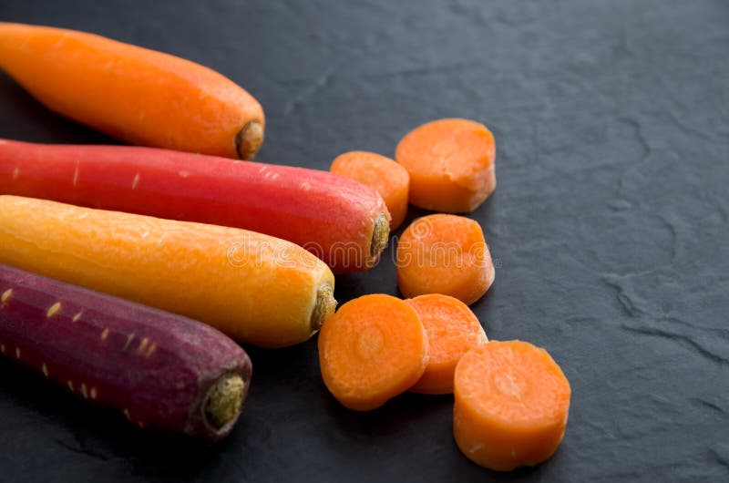 Fresh Delicious Colored Carrots on Dark Background Stock Image - Image ...