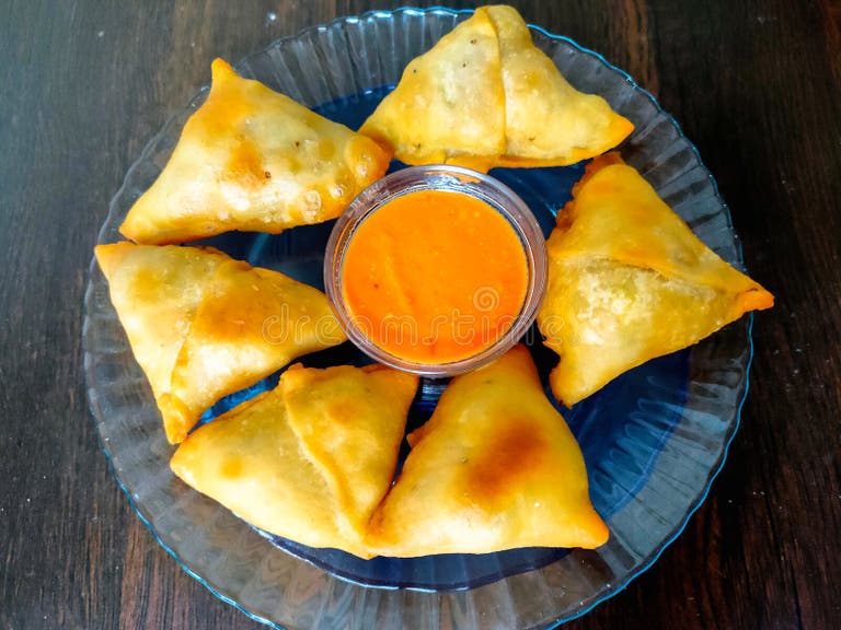 Fresh Delicious Crispy Samosas with Sauce Stock Photo - Image of angle ...