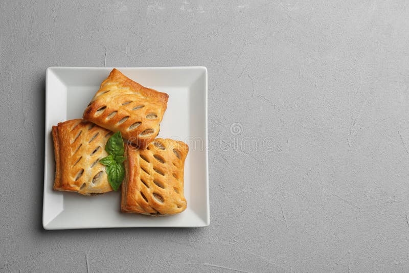 Fresh Delicious Puff Pastry on Grey , Top View. Space for Text Stock ...