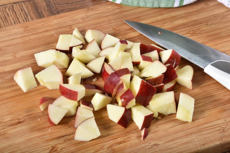 Fresh Diced apples stock image. Image of uncooked, board - 106310433