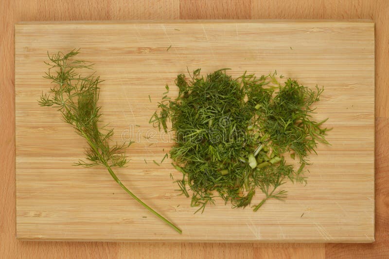 Fresh dill sprigs stock image. Image of fresh, board - 365049007