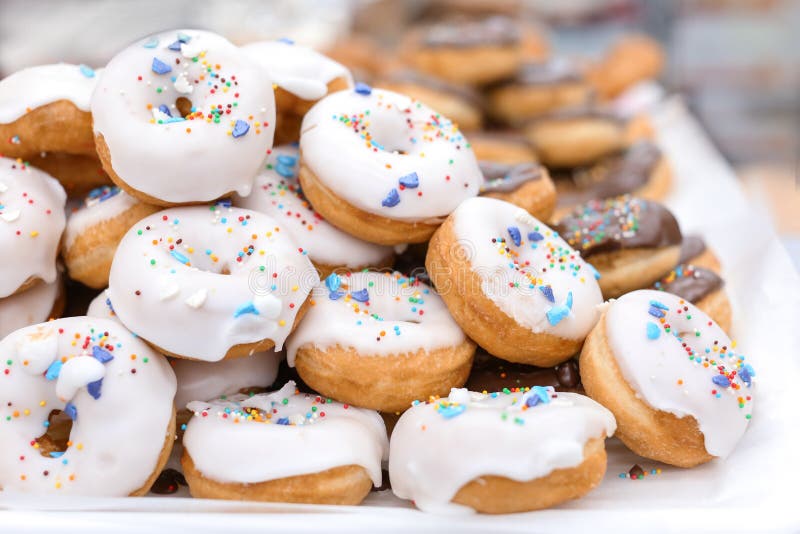 Fresh donuts in bakery stock photo. Image of gastronomy - 150078908