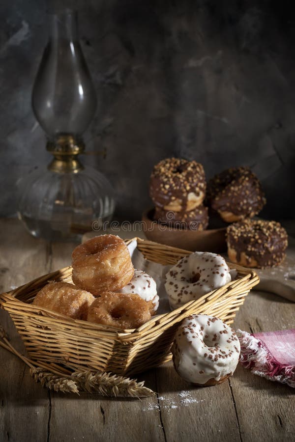 Fresh Donuts in a Wicker Basket on a Rustic Table Stock Image - Image ...