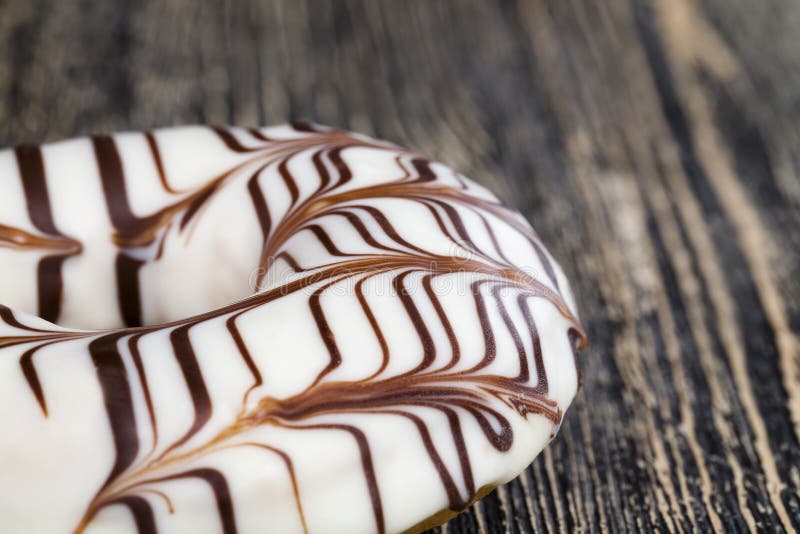 A Fresh Doughnut Covered with White Chocolate , Closeup Stock Photo ...