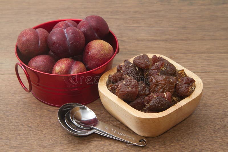 Fresh and dried plums stock photo. Image of earth, black - 32212562