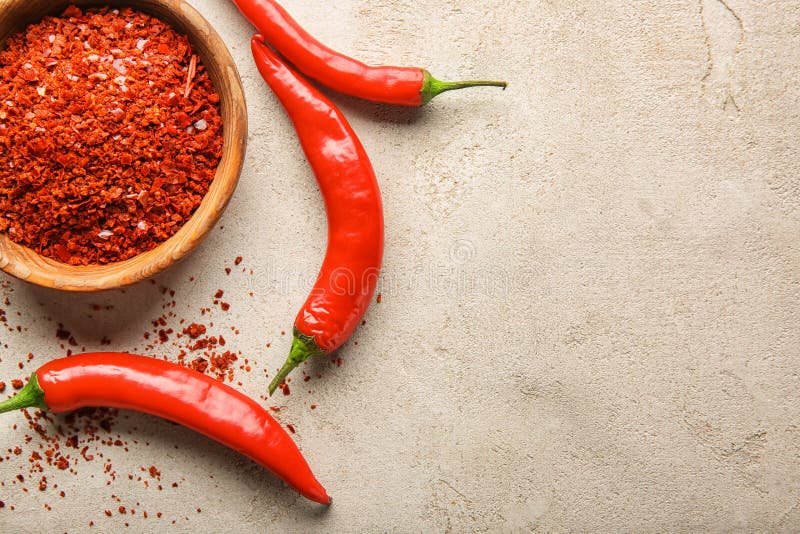 Fresh and Dry Granulated Chili Pepper on Table Stock Photo - Image of ...