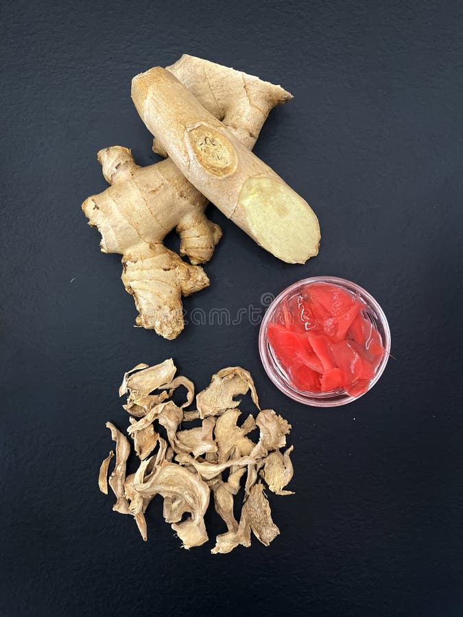 Fresh, Dry and Pickled Ginger on a Black Matte Stone Surface Stock ...