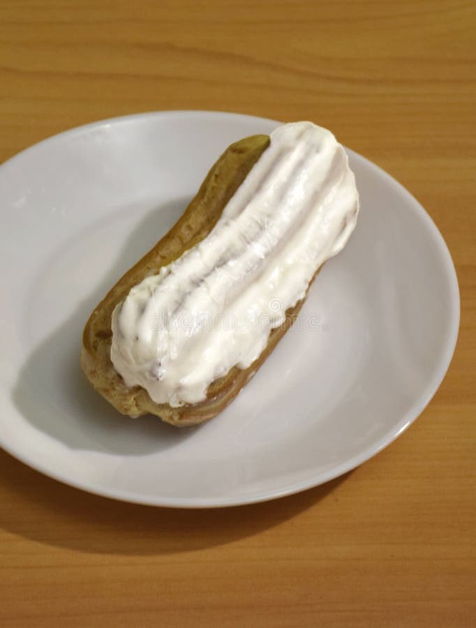 Fresh Eclair with White Chocolate Stock Image - Image of baked ...