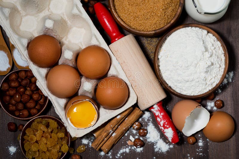 Fresh Eggs and Baking Ingredients on Wooden Table, Top View Stock Image ...