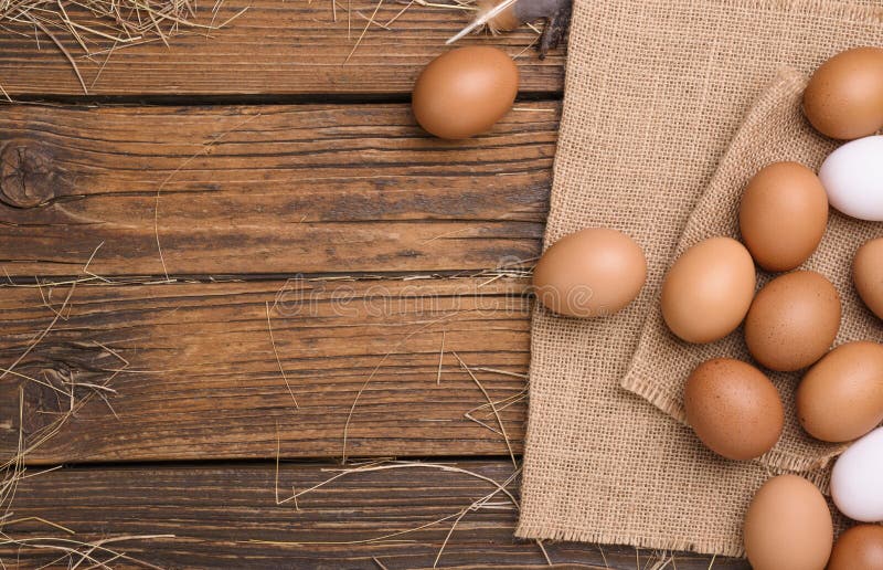 Fresh Eggs on an Old Wooden Table on an Organic Farm - Top View Stock ...