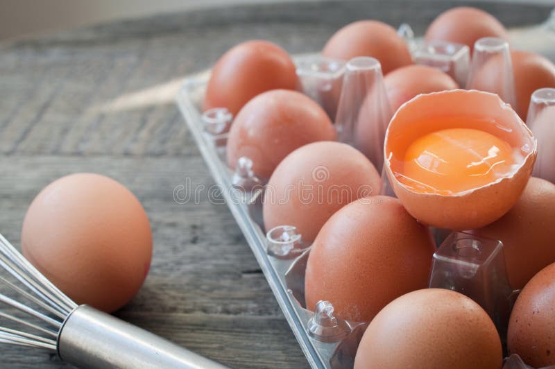 Fresh Eggs with One Cracked Open Ready To Cook with Stock Image - Image ...